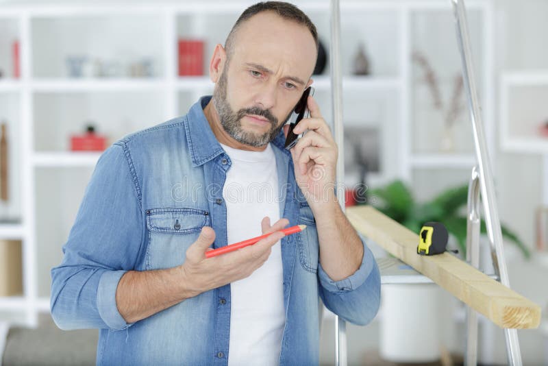 Man Solvind Diy Problems Over Phone Stock Image - Image of contractor ...