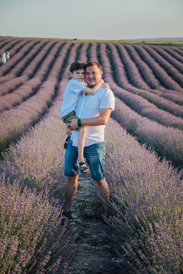 Man with Son on a Lavender Field Stock Image - Image of violet, girl: 397449337