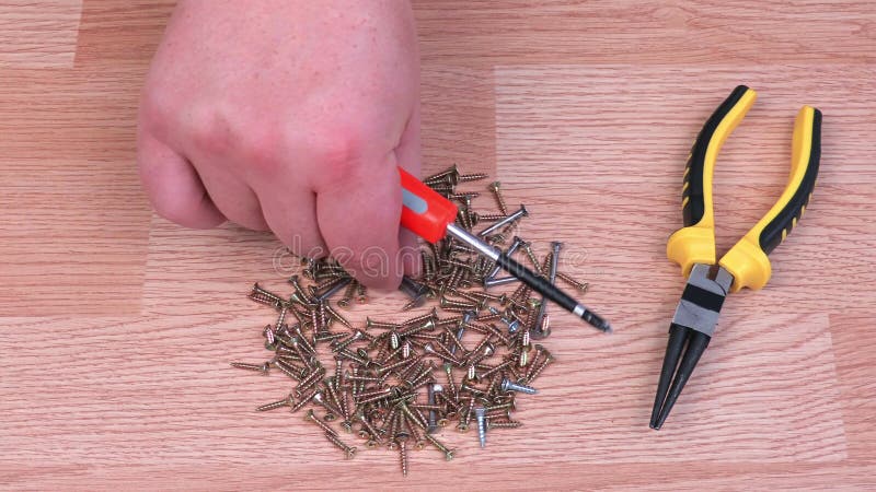 Metal Screws, Stainless Bolts, Steel Anchors with Threads Rotating on ...