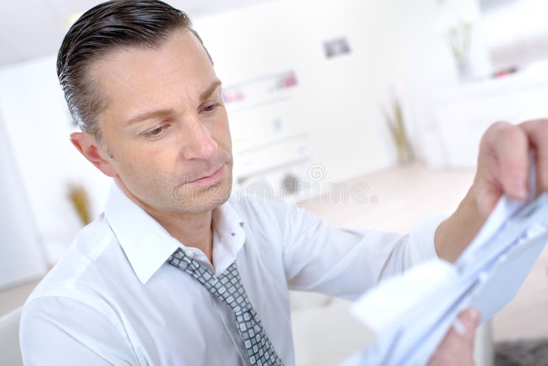 Man sorting out letters stock image. Image of envelope - 266720901