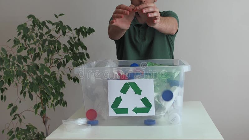 Man Sorting Plastic Drink Bottle Caps and Lids Recyclable Materials for ...
