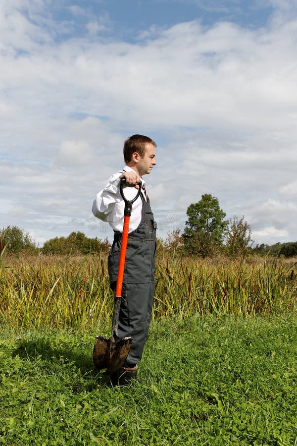 Man and spade. stock image. Image of denim, digger, gardener - 21049489