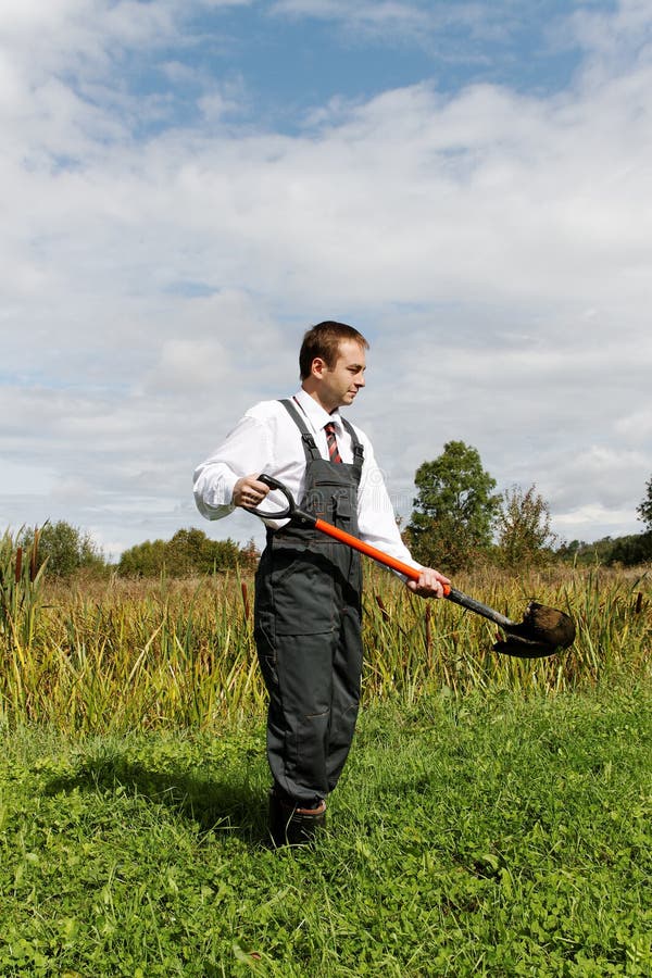 Man and spade. stock image. Image of paper, overalls - 21049677
