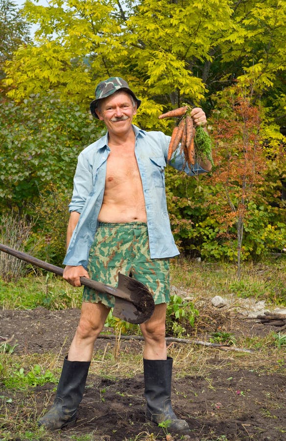 Man with Spade and Carrot 2 Stock Image - Image of human, boot: 16717209