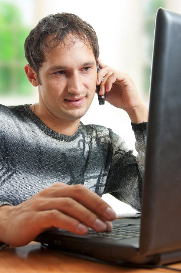 Man Speak Phone and Working at Home Stock Image - Image of searching ...
