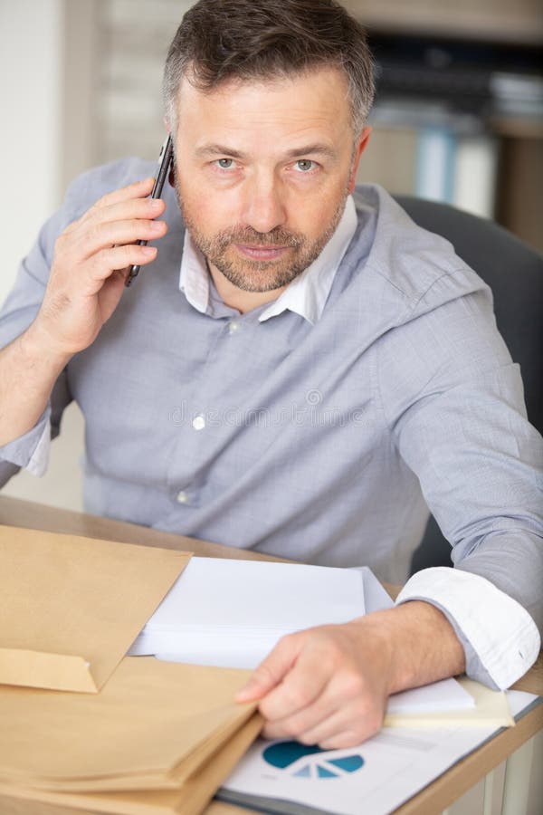 Man Speaking on Smart Phone Stock Image - Image of bearded, settle ...