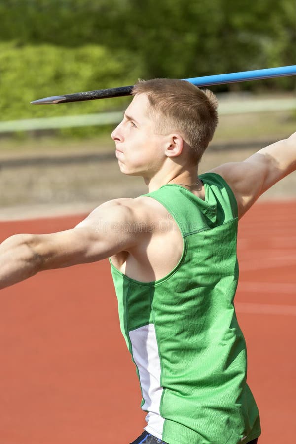 Man spear throw stock photo. Image of athlete, male, teen - 32008426