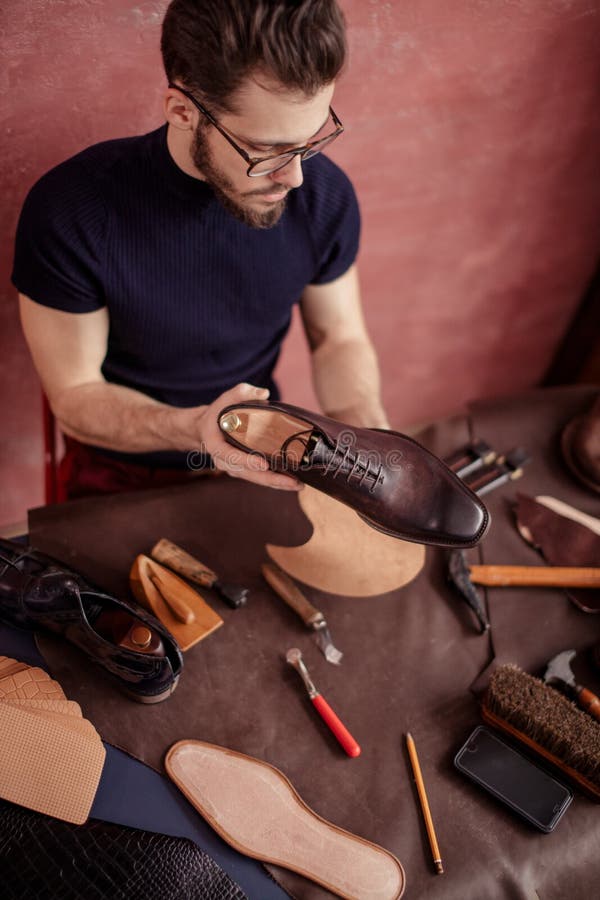 Man Specializing in Creating Shoes and Boots Stock Image - Image of ...