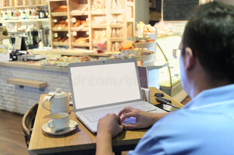 Man Spectacled Working on His Computer at Cafe, Stock Photo - Image of ...