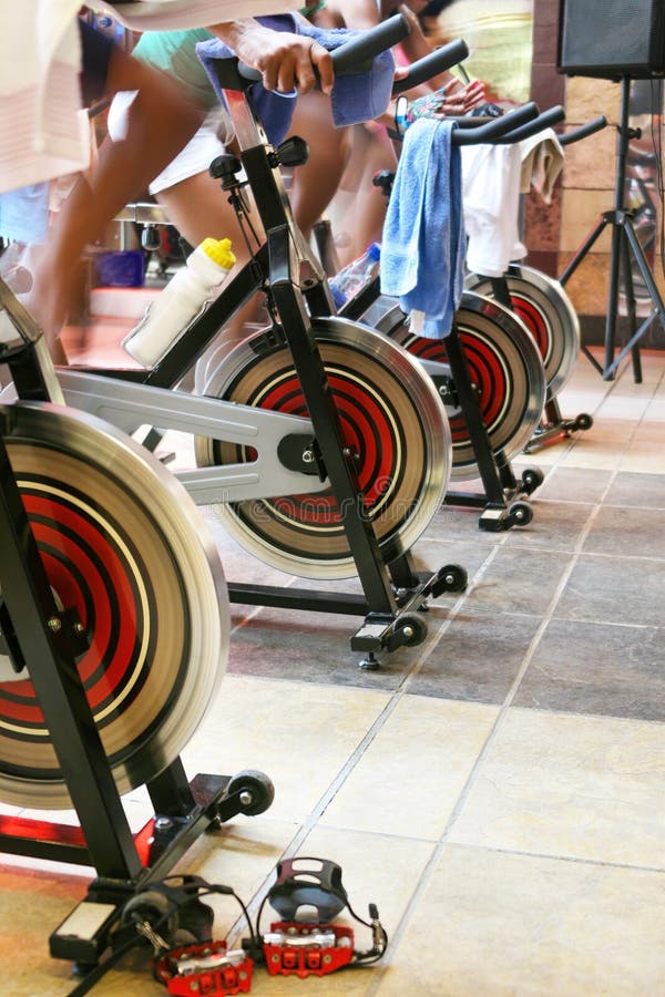 Fitness spinning bikes stock image. Image of active, riding - 3468819