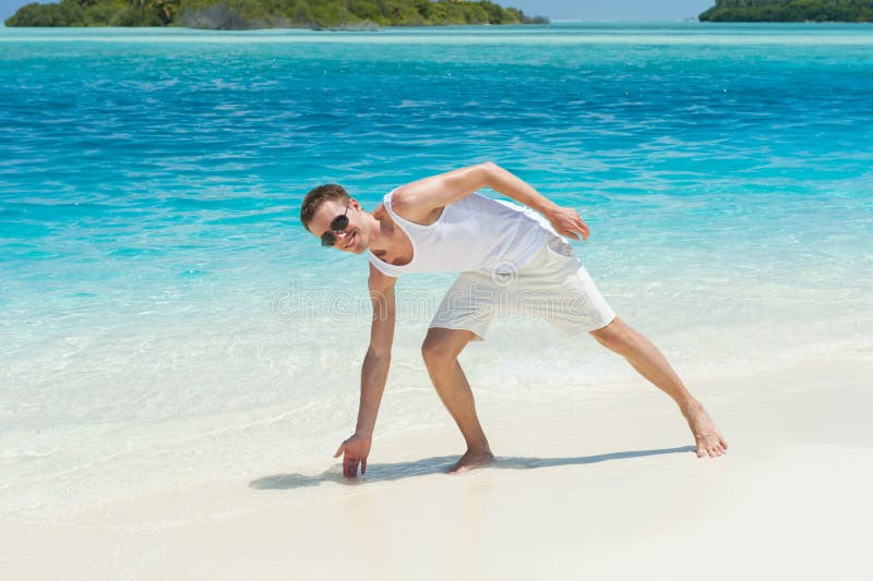 Man Splash Water Of The Ocean At The Background Of Island Stock Image ...