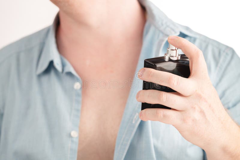Man spray on perfume stock photo. Image of care, masculine - 95886800