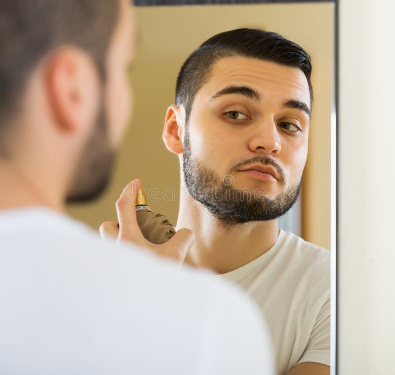 Man Spraying Fragrance Perfume Stock Photo - Image of skin, care: 61043194