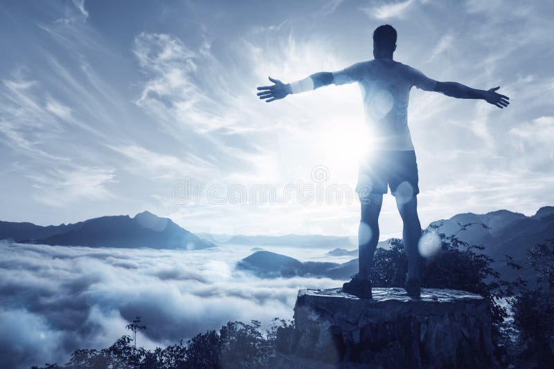 Man on a Summit Over an Ocean of Clouds Stock Photo - Image of ...