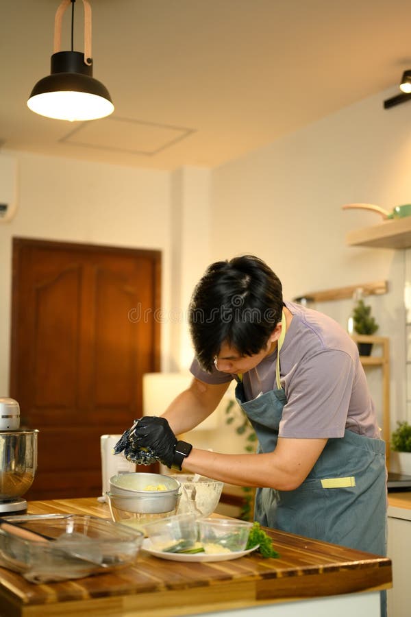 Man Squeezing Freshly Churned Butter, Separating Buttermilk into Bowl ...