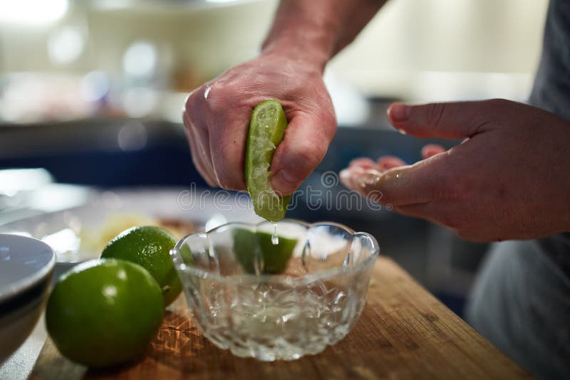 Chef S Hands Squeezing Lime Stock Image - Image of industrial, adult ...