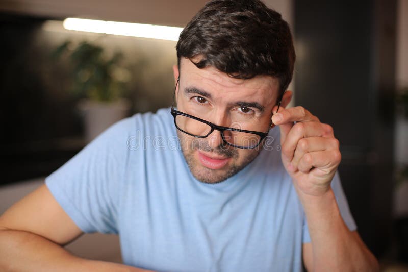 Man Squinting and Putting His Eyeglasses Down Stock Image - Image of ...