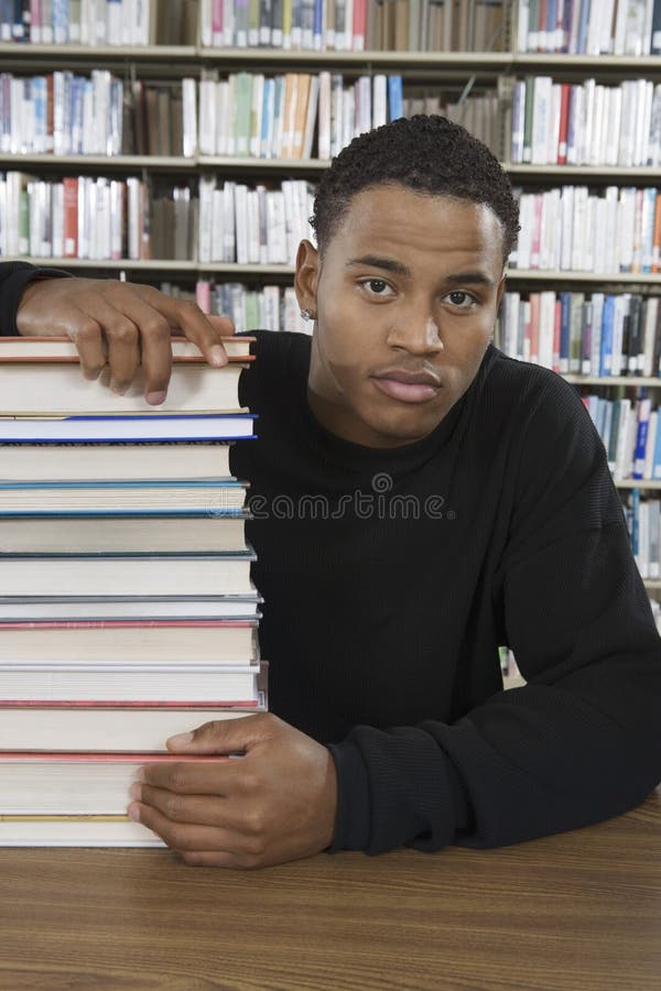 Man with Stack of Books stock photo. Image of relax, learn - 29648710