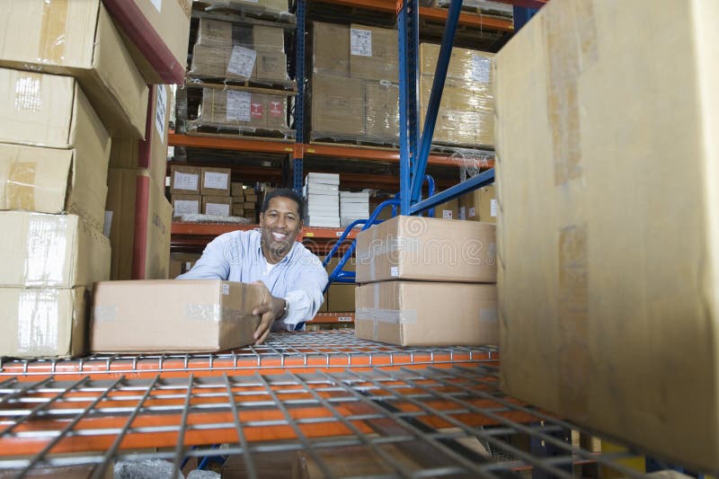 Man Stacking Boxes in Warehouse Stock Image - Image of line, inspecting ...