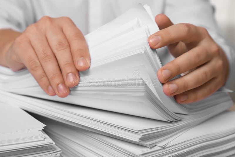 Man Stacking Documents in Office, Closeup View Stock Image - Image of ...