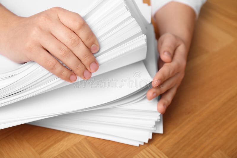 Man Stacking Documents at Wooden Table, Top View Stock Image - Image of ...