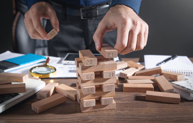 Man Stacking a Wooden Blocks. Business. Plan Stock Photo - Image of ...