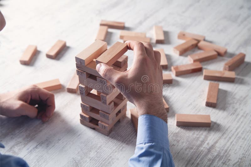 Man Stacking Wooden Blocks. Development Concept Stock Image - Image of ...