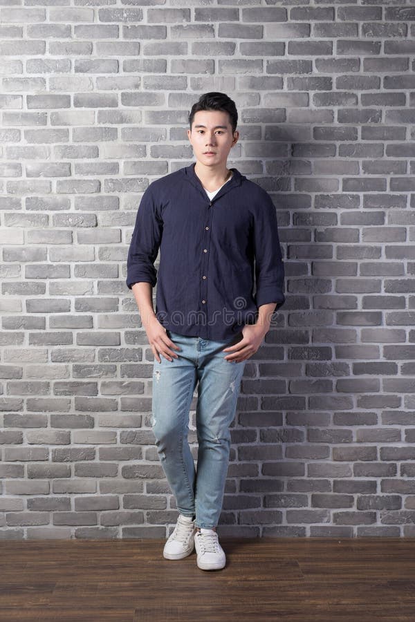 Man stand with brick wall stock image. Image of vision - 86874495