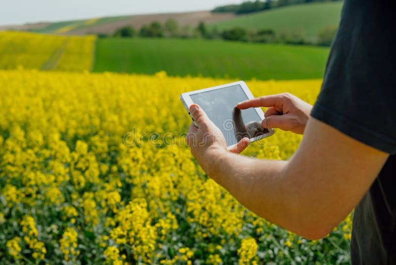 Farmer holding tablet stock image. Image of nature, display - 141820579