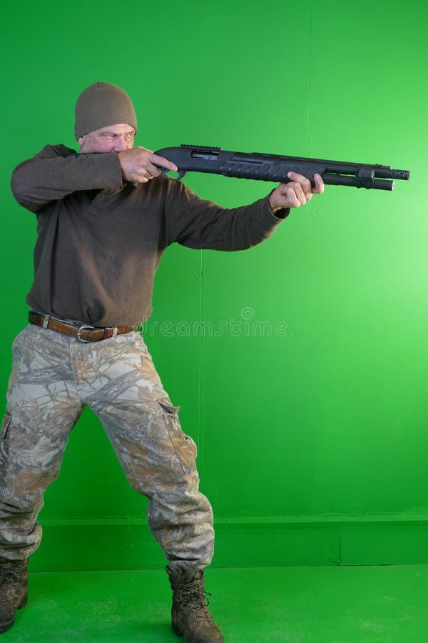 Man Standing Aiming Military Combat Shotgun. Stock Photo - Image of ...