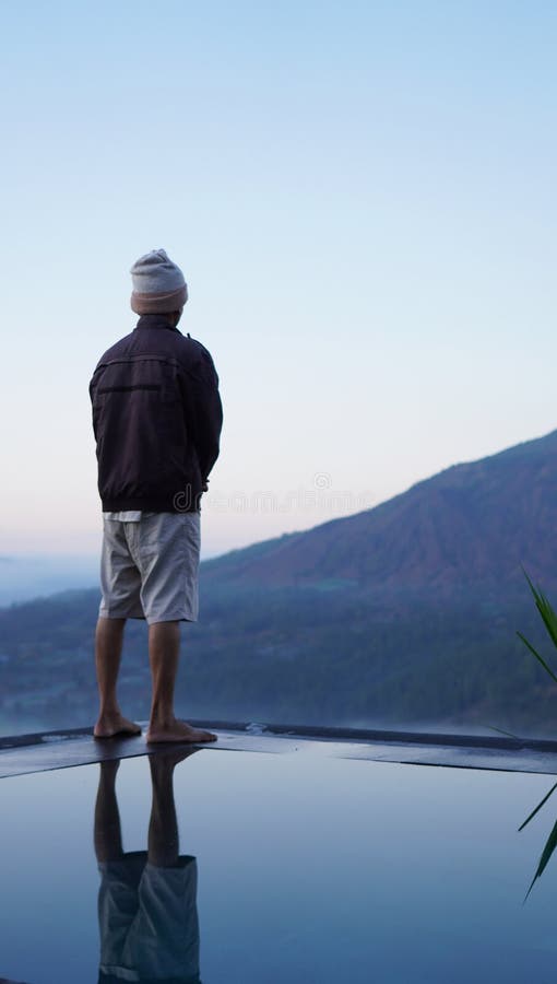 Man Standing Alone from Behind on the Edge of the Pool on the ...