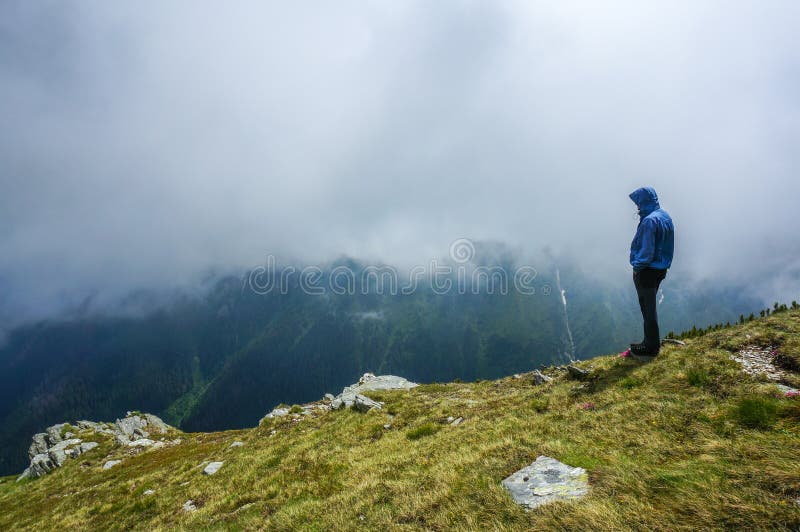 Man Standing Alone in the Mountains Stock Image - Image of concept ...