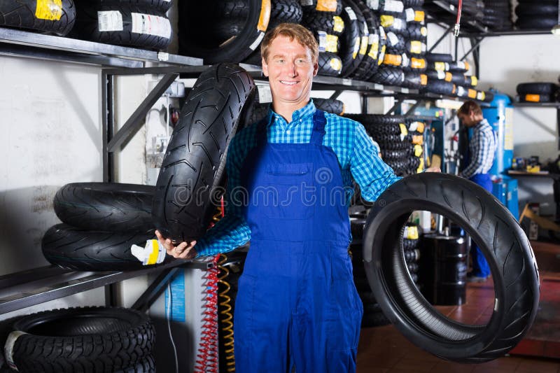 Man Standing with Auto Tires Stock Image - Image of discount, caucasian ...