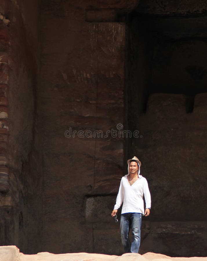 Man Standing Behind an Ancient Building during Daytime Stock Photo ...