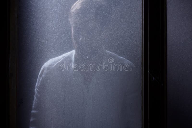 Man standing behind window stock image. Image of rejection - 86607739