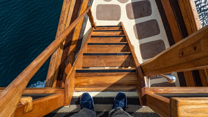 Man Standing on Boat Stair in Sunlight Stock Image - Image of ...