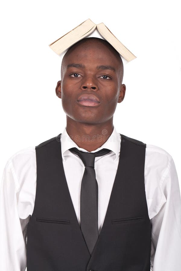 Man Standing with a Book on His Head Stock Photo - Image of student ...