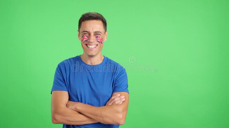 Man Standing with British Flag Painted on Face Smiling Stock Footage ...