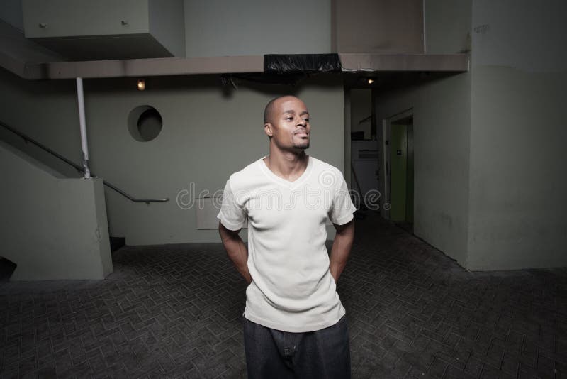 Man standing by a building stock photo. Image of glance - 14428170