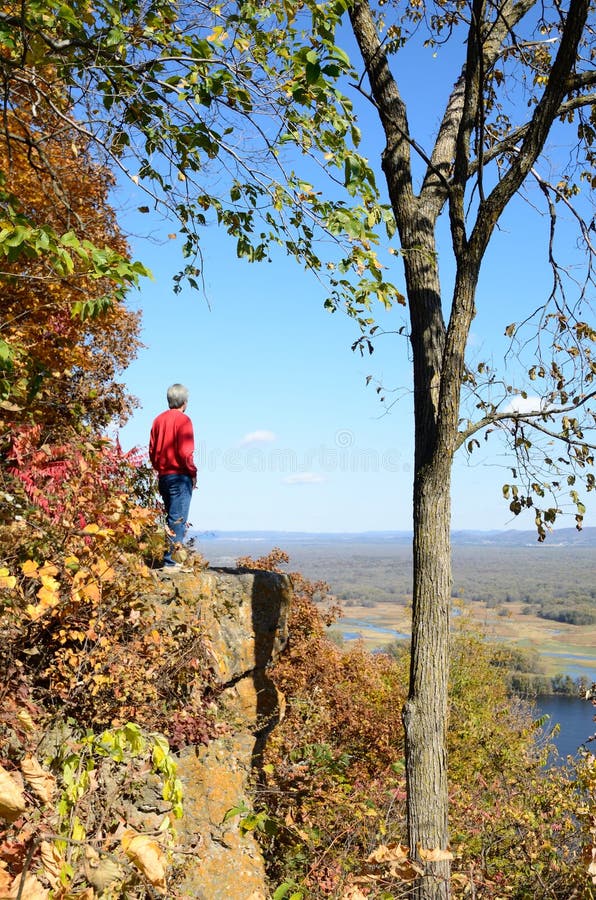 Man Standing on a Cliff Above the Mississippi River Stock Image - Image ...