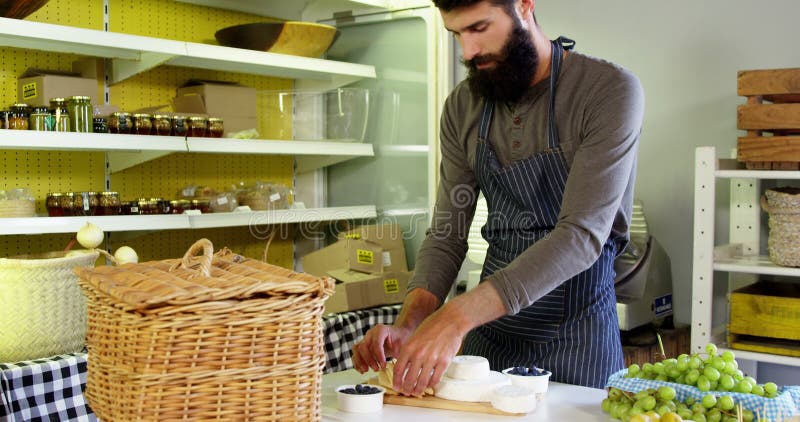 Man standing at counter stock footage. Video of food - 97055540