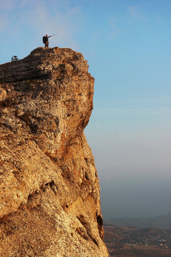 Man Standing on Edge of the Cliff Stock Photo - Image of cliff, active ...