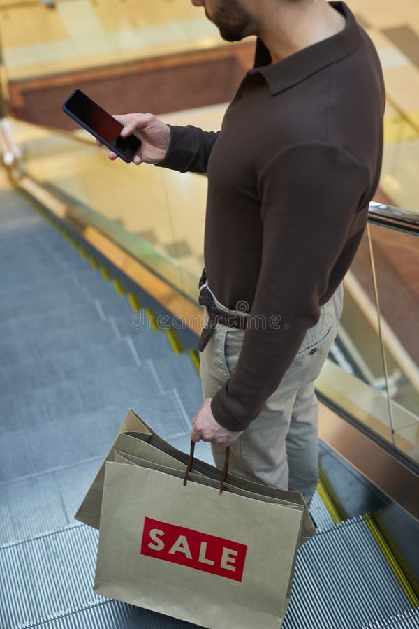 Man Standing on Escalator in Shopping Mall Stock Image - Image of mall ...