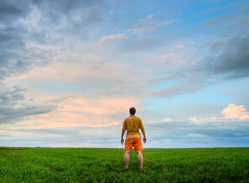 Man standing on field stock photo. Image of field, environment - 10620766