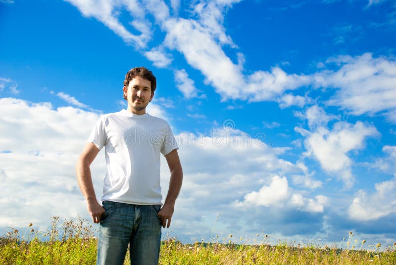 Man standing in a field stock image. Image of looking - 21226675