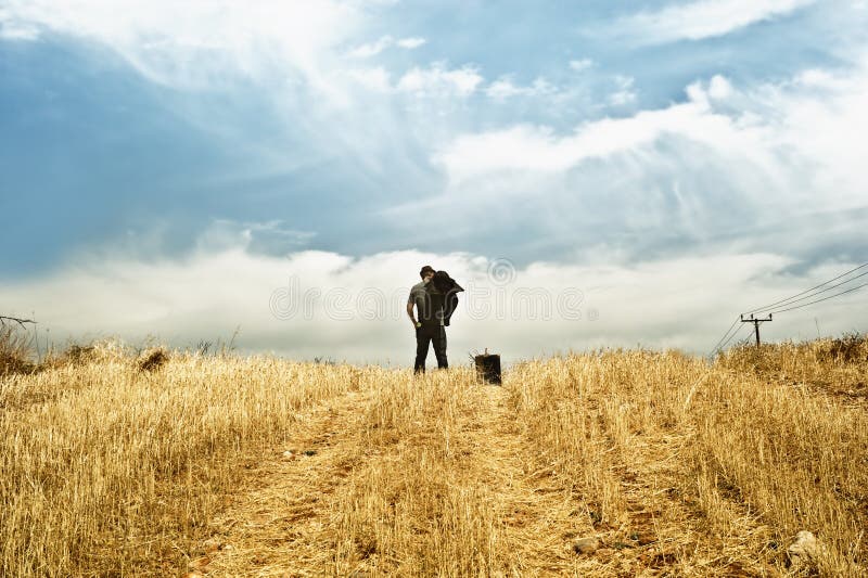 Man Standing In A Field Stock Images - Image: 35050324