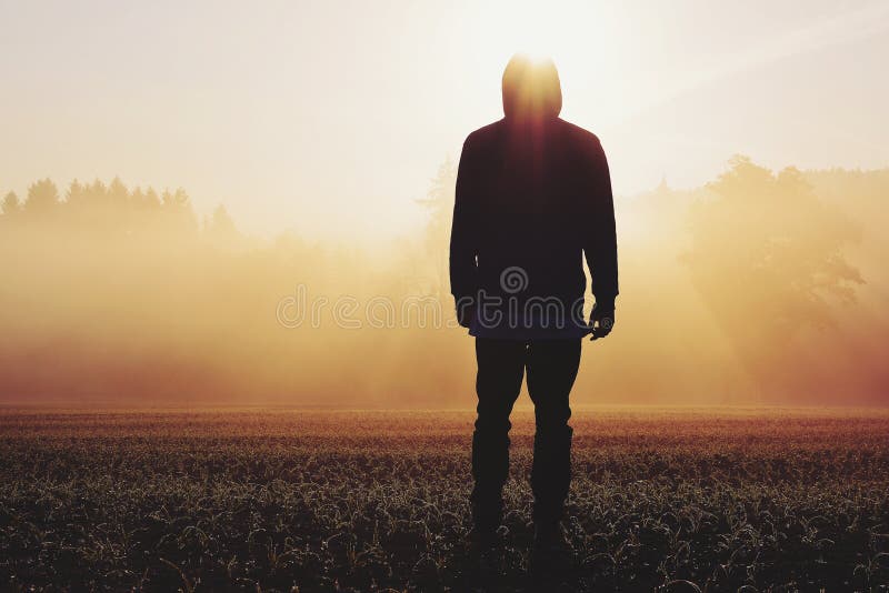 Man Standing in the Fog at Sunrise Stock Photo - Image of mist, autumn ...