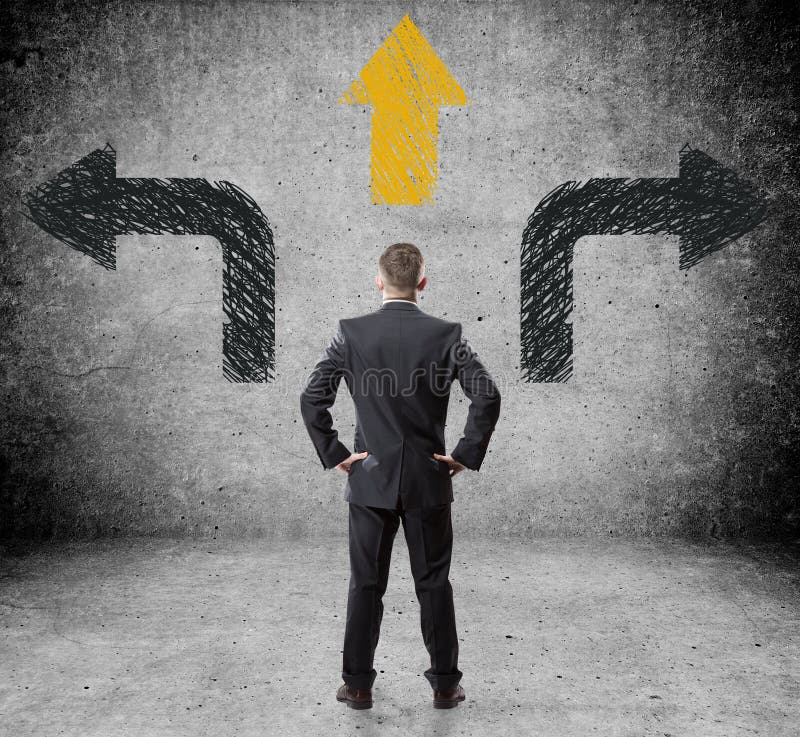 Man Standing in Front of the Choise Stock Photo - Image of arrow, front ...