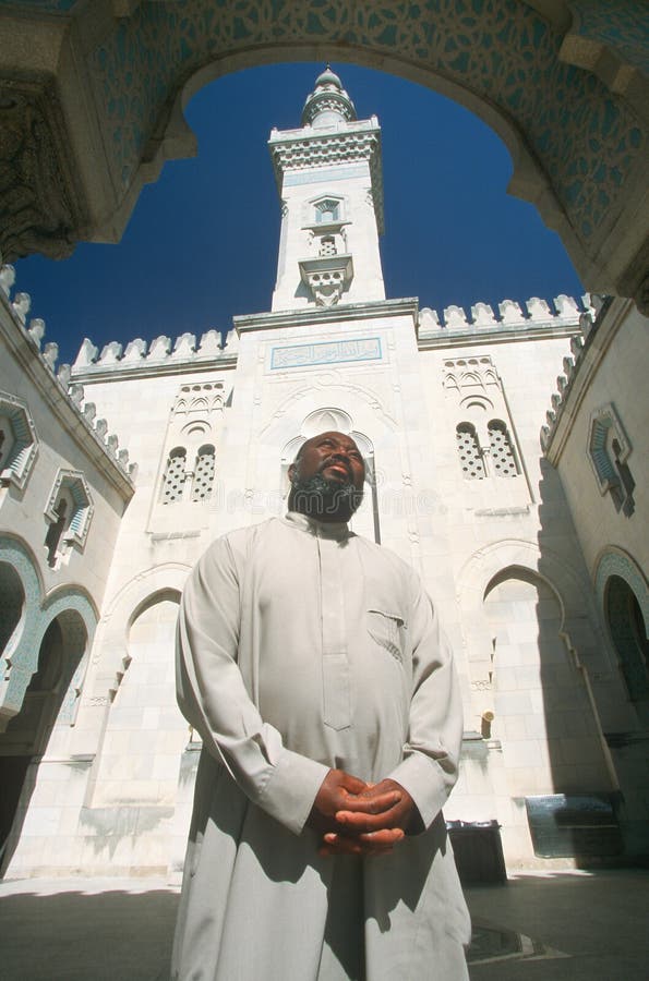 A Man Standing in Front of an Islamic Study Center Editorial Photo ...