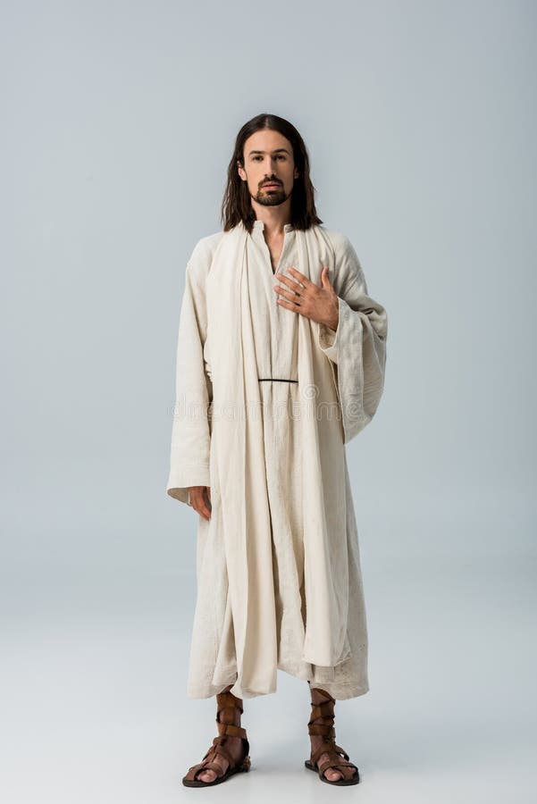 Man Standing with Hand on Chest on Grey Stock Image - Image of ...